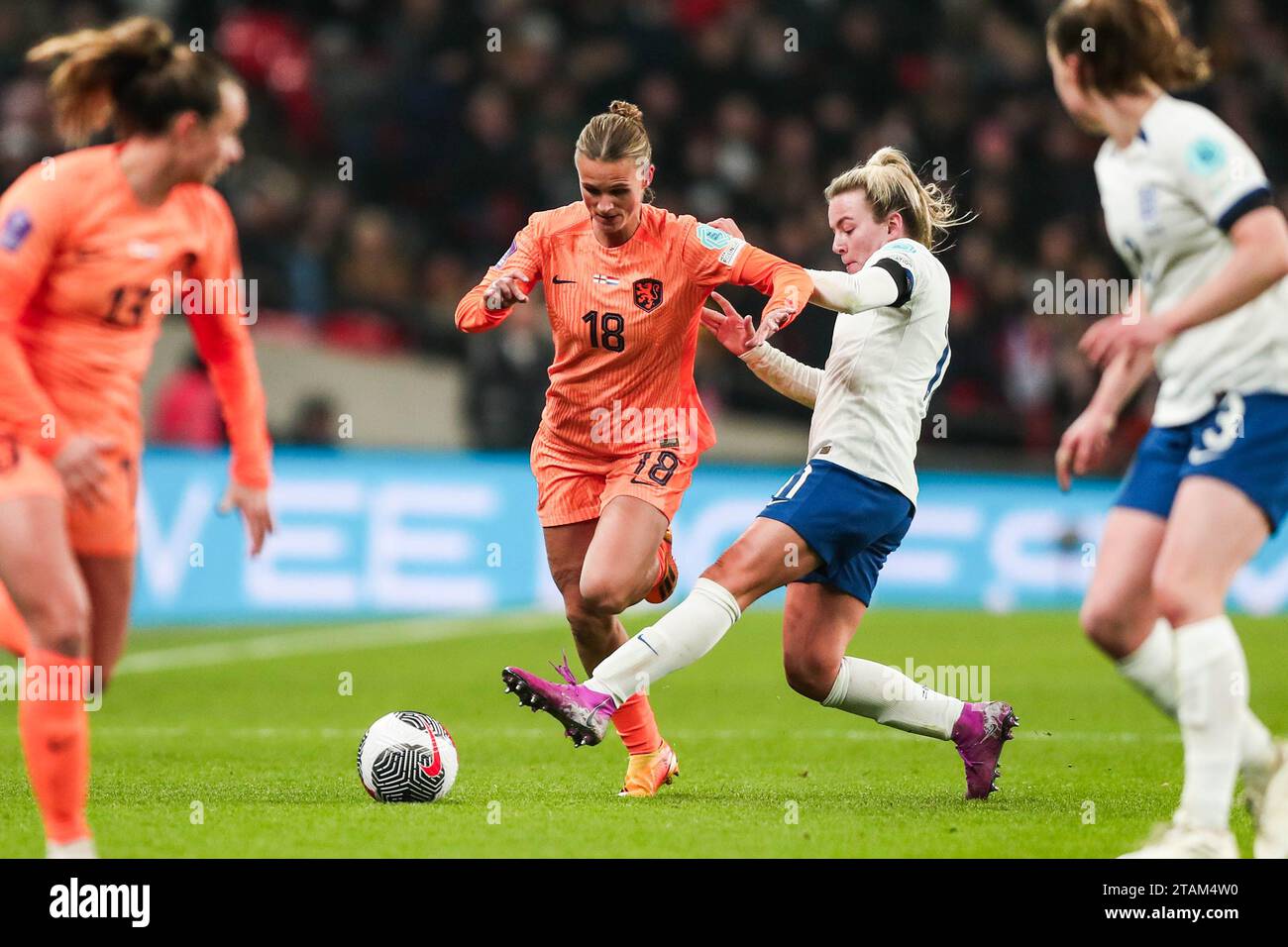 Netherlands' Kerstin Casparij battles for the ball against England's ...