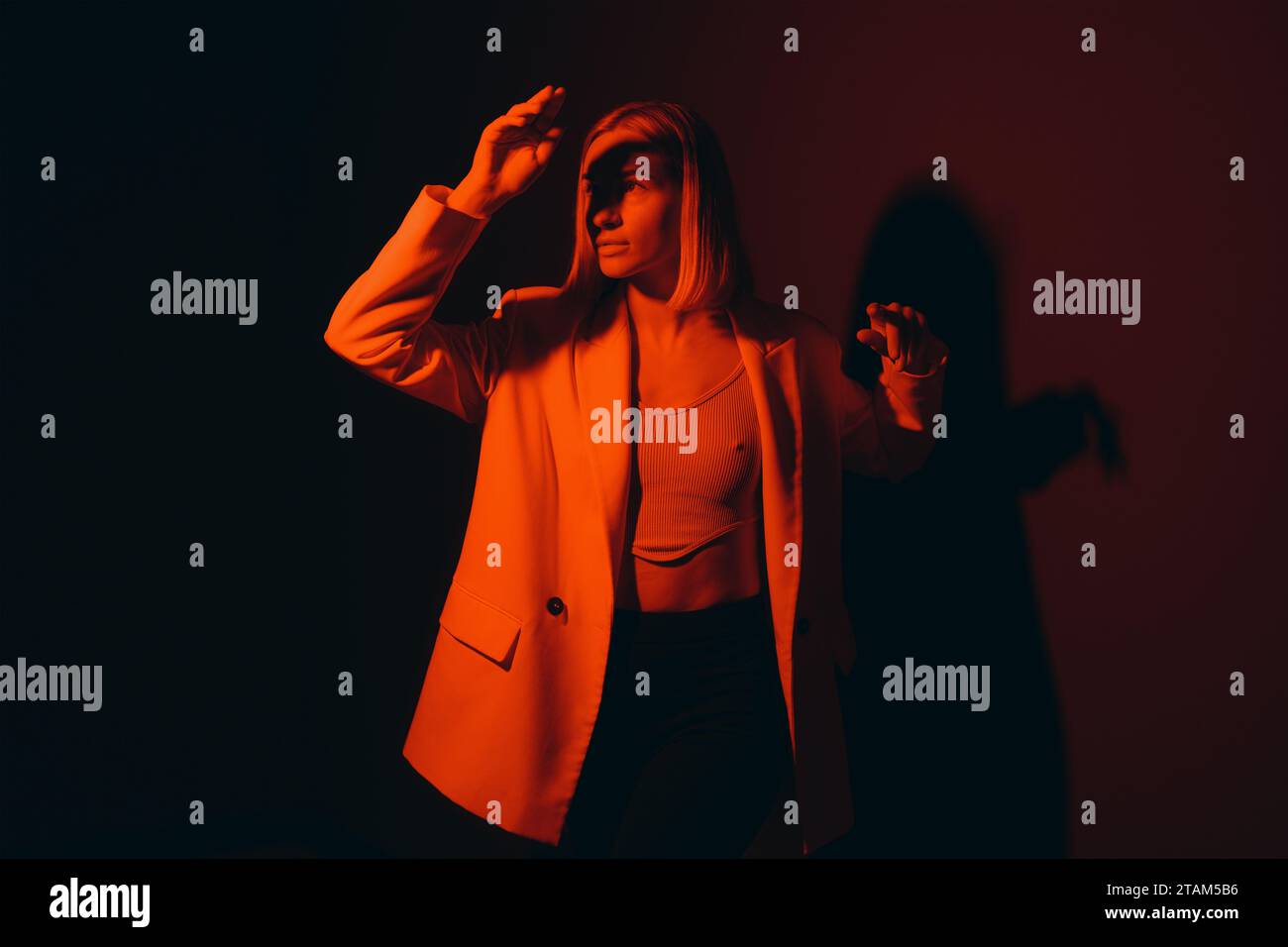 Vibrant red blazer hi-res stock photography and images - Alamy