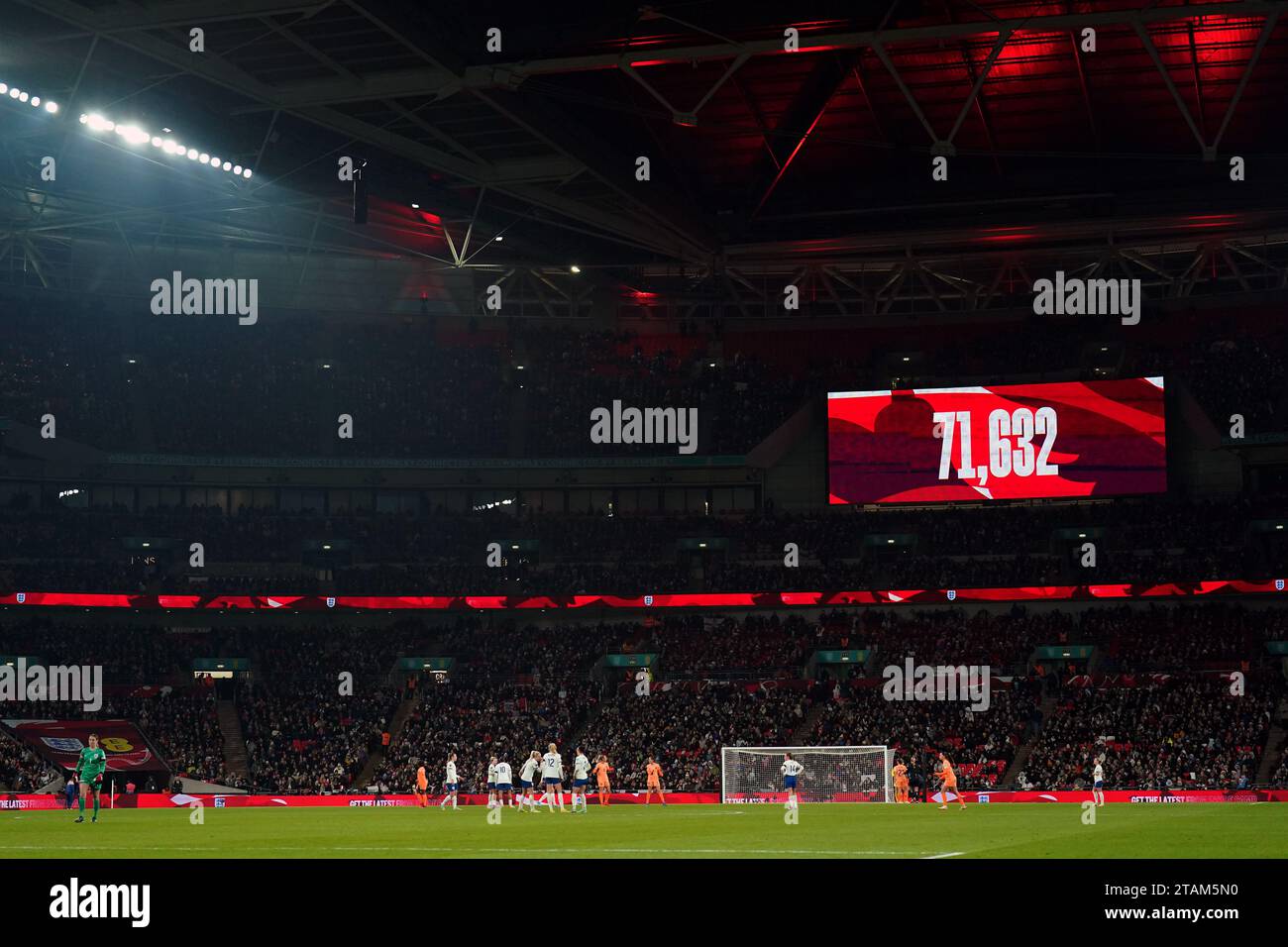 A general view as the big screen shows the match attendance of 71,632 ...