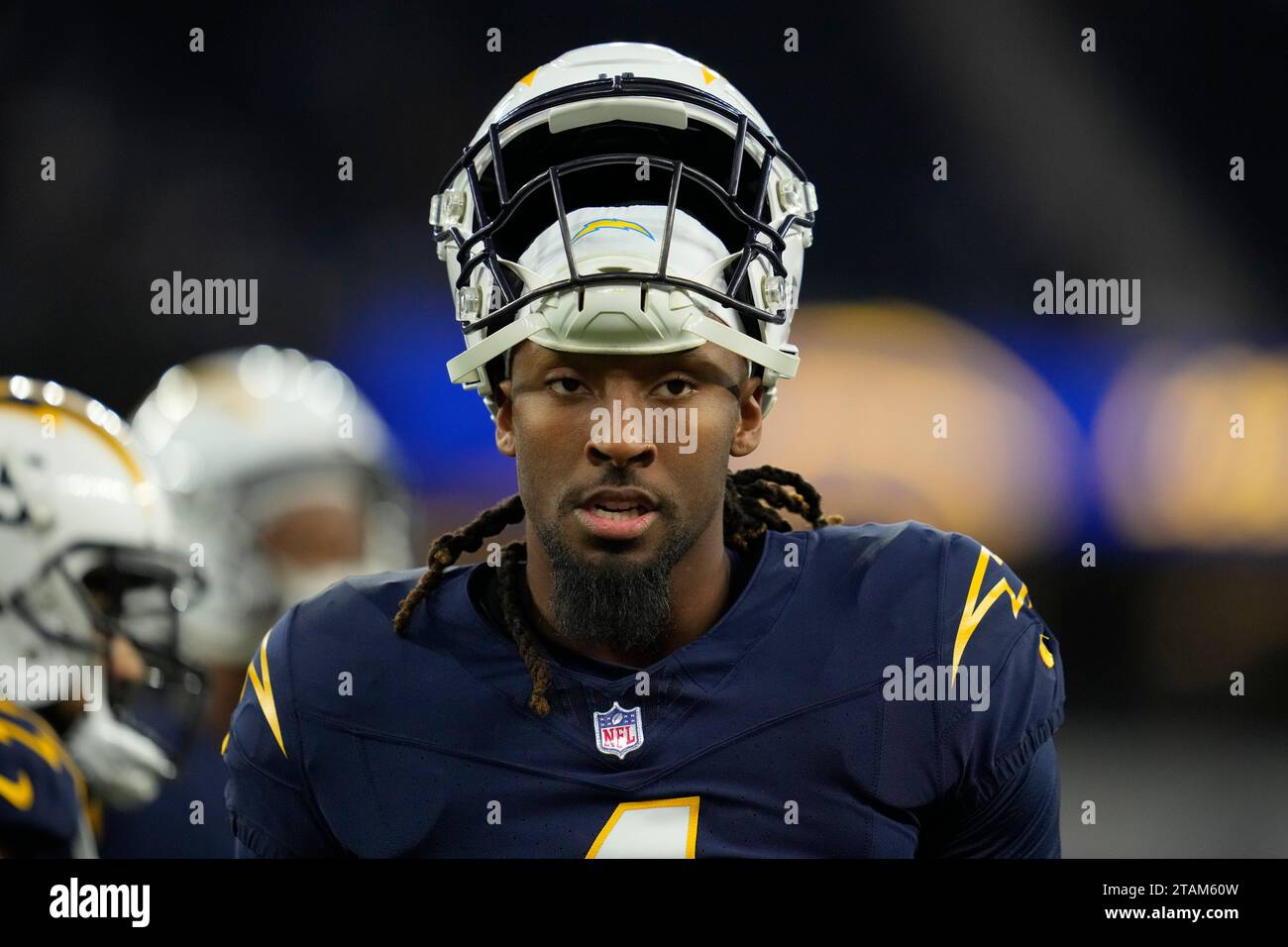 Los Angeles Chargers wide receiver Quentin Johnston warms up before an ...