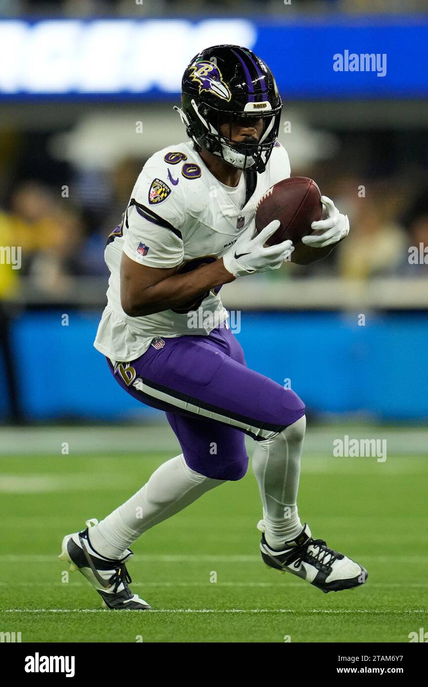 Baltimore Ravens tight end Isaiah Likely (80) runs the ball during an ...