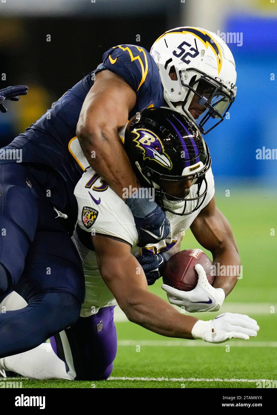 Los Angeles Chargers linebacker Khalil Mack (52) tackles Baltimore ...