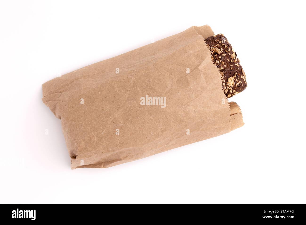 homemade freshly baked traditional rye bread in paper bag isolated on ...