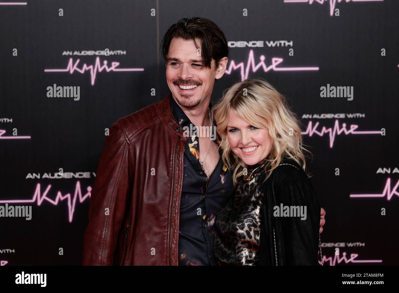 Kenny Doughty, left, and Ashley Jensen pose for photographers upon ...