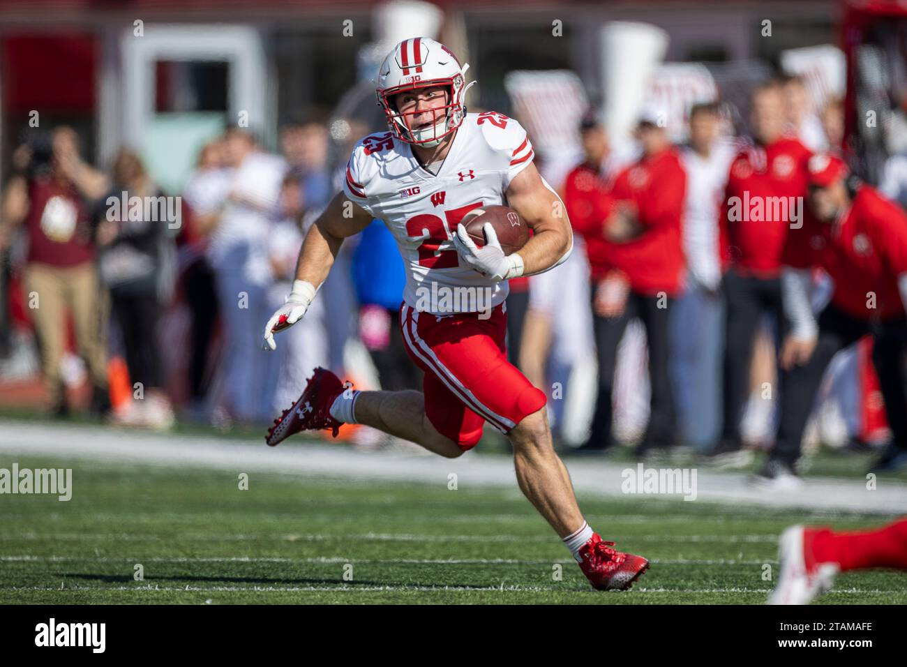 Wisconsin Badgers running back Cade Yacamelli (25) carries the ball ...