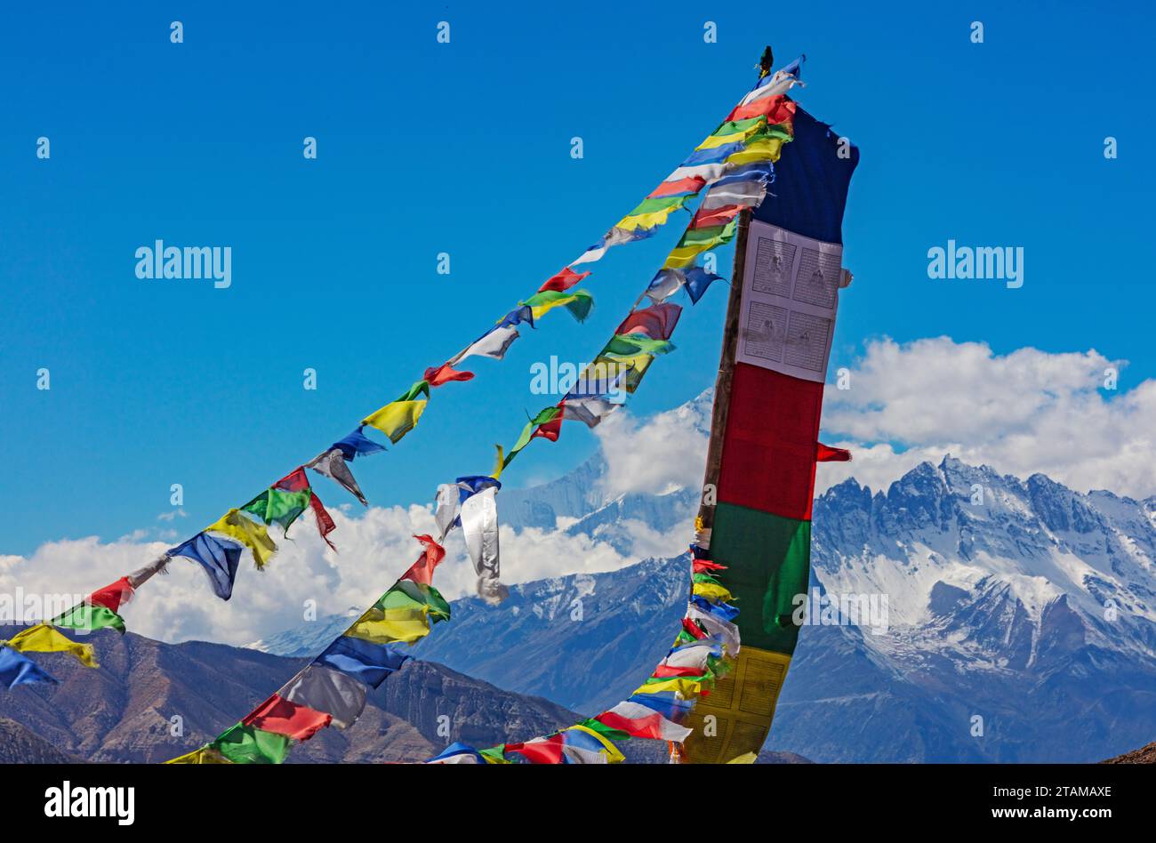 Prayer flags on the pass from Yara to Tange village with views to the ...