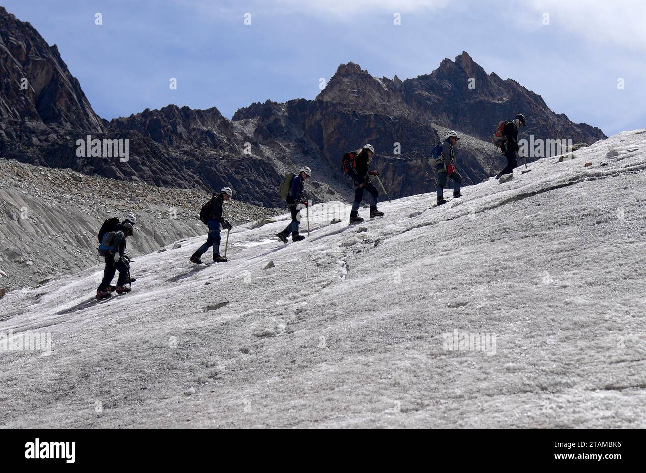 Tourists hike up the Huayna Potosi glacier near El Alto, Bolivia ...