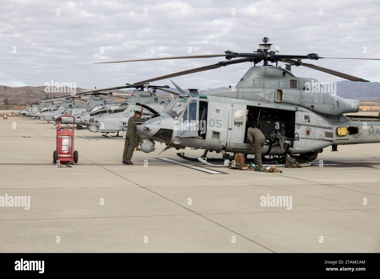 U.S. Marines with Marine Light Attack Helicopter Squadron (HMLA) 367 ...