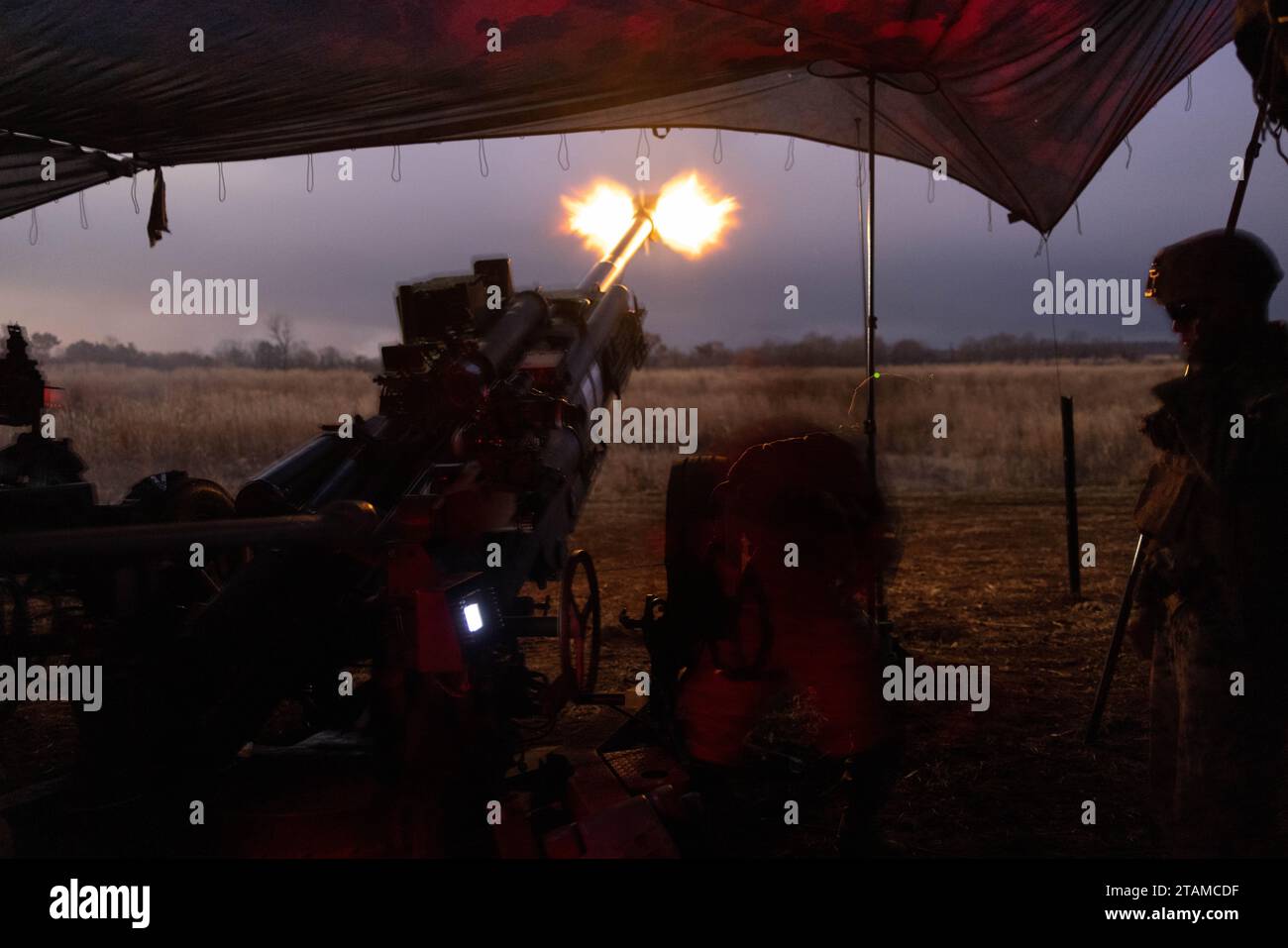 U.S. Marine Corps Cpl. Freeman Diah fires an M777 Howitzer during ...
