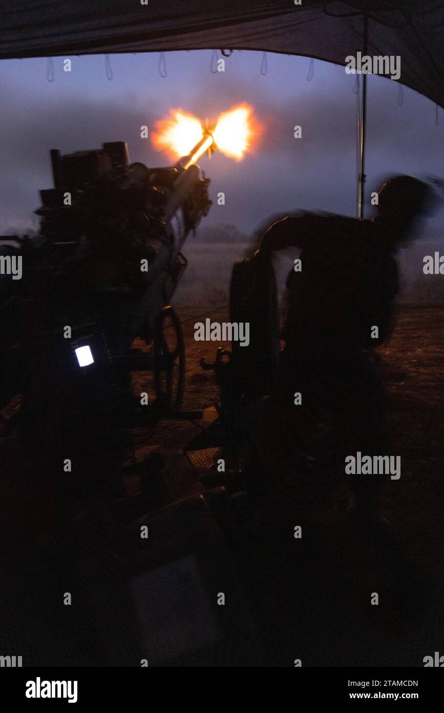 U.S. Marine Corps Cpl. Freeman Diah fires an M777 Howitzer during ...