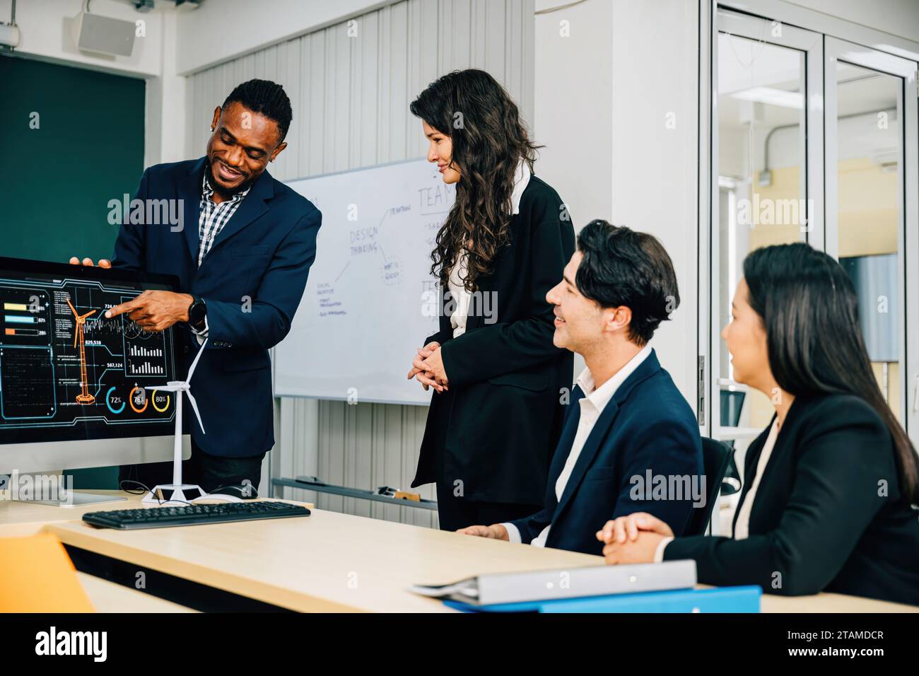 Colleagues collaborate in a modern office on a startup project ...