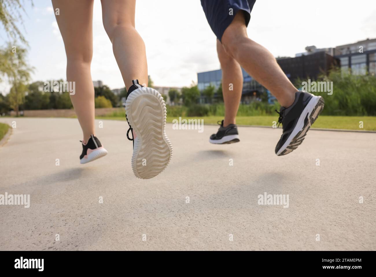 Woman run low angle feet hi-res stock photography and images - Alamy