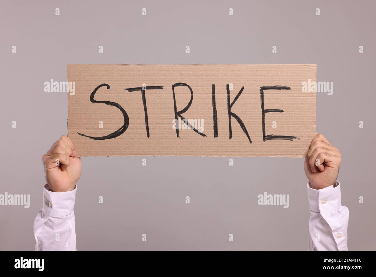 Hands holding placard written sign hi-res stock photography and images ...