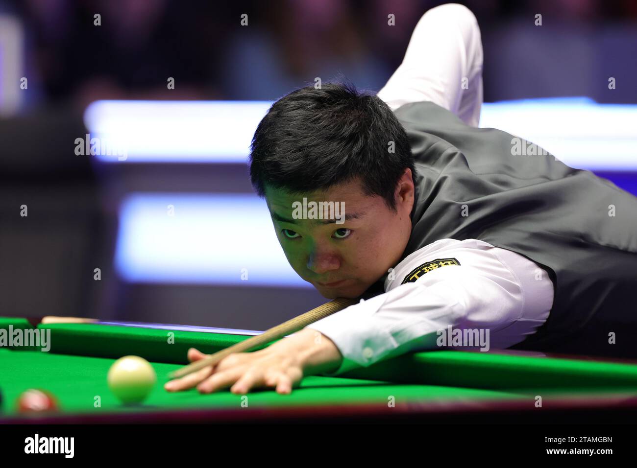 York, Britain. 1st Dec, 2023. Ding Junhui of China competes during the ...
