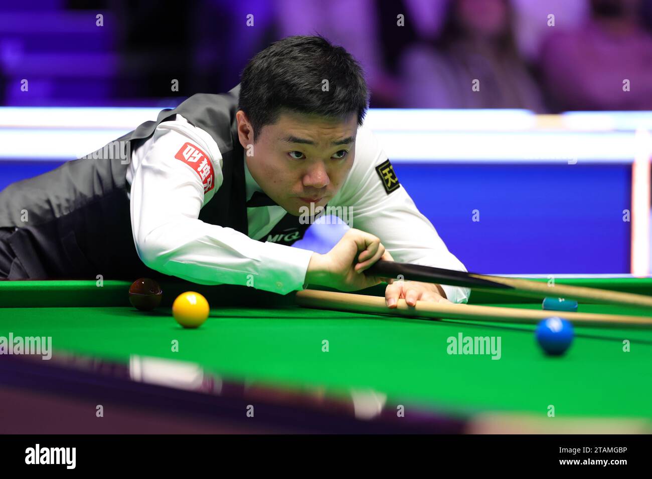 York, Britain. 1st Dec, 2023. Ding Junhui of China competes during the ...