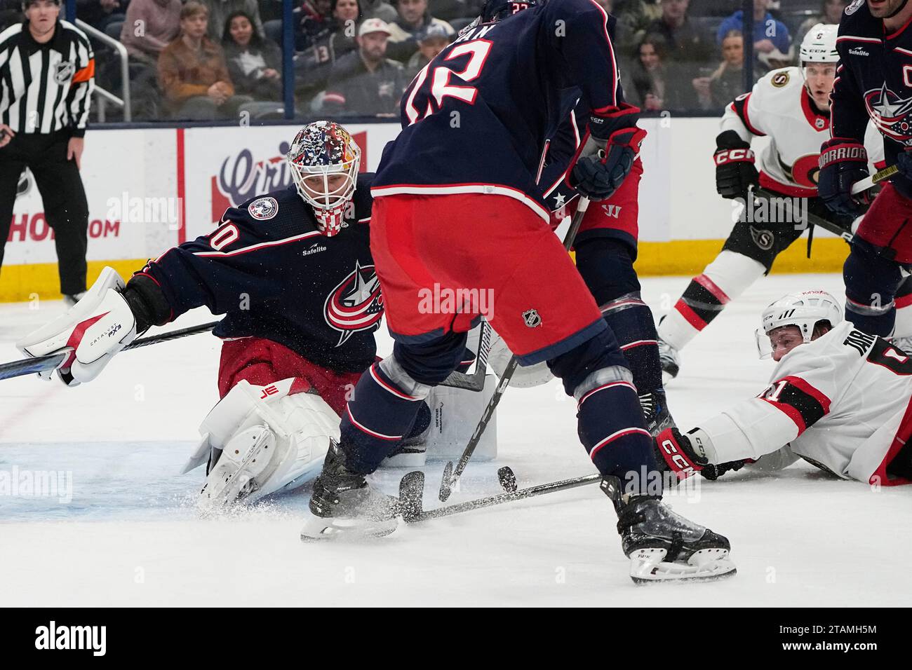 Ottawa Senators right wing Vladimir Tarasenko, lower right, reaches for ...