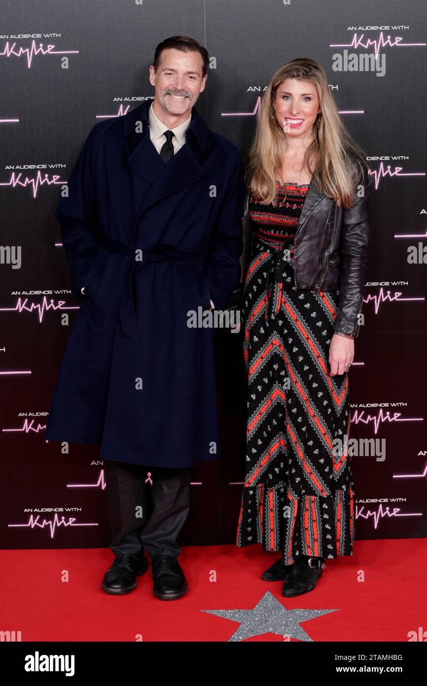 Patrick Grant, left, and Rachael Hampton pose for photographers upon ...