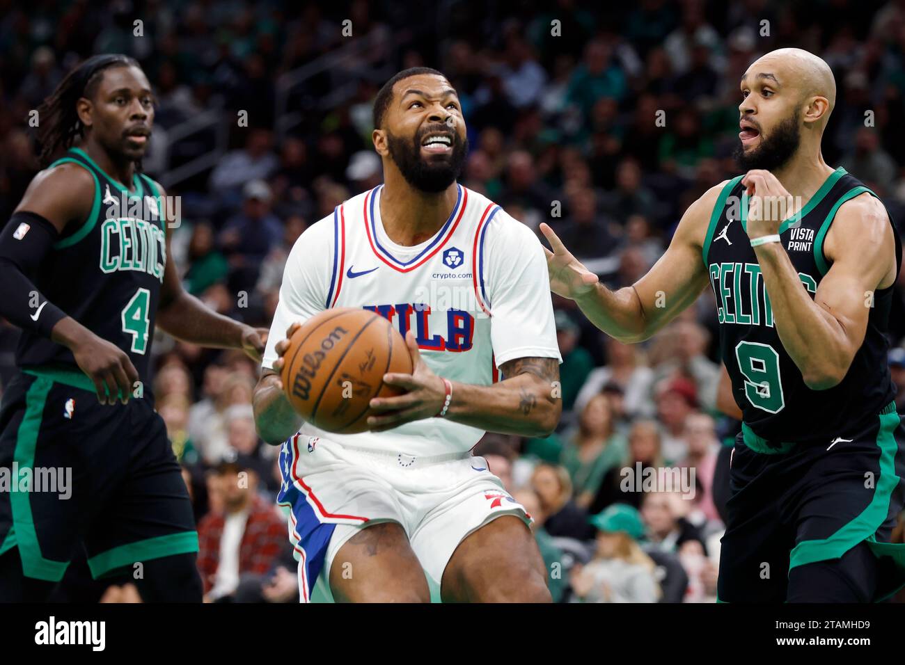 Philadelphia 76ers' Marcus Morris Sr. looks to shoot, between Boston ...
