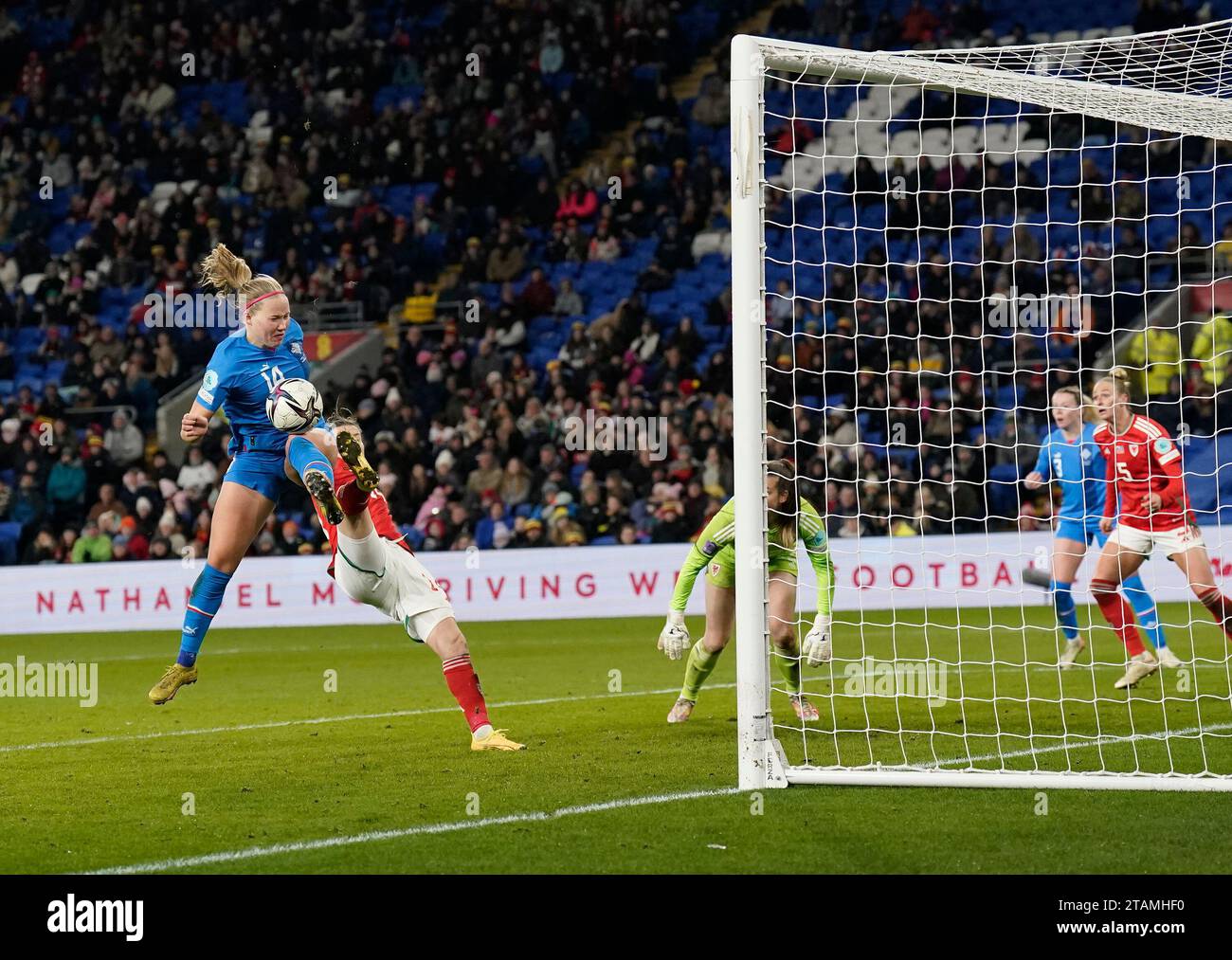 Cardiff,UK, 01 Dec 2023 Hayley Ladd (Wales) clears ball during the UEFA ...