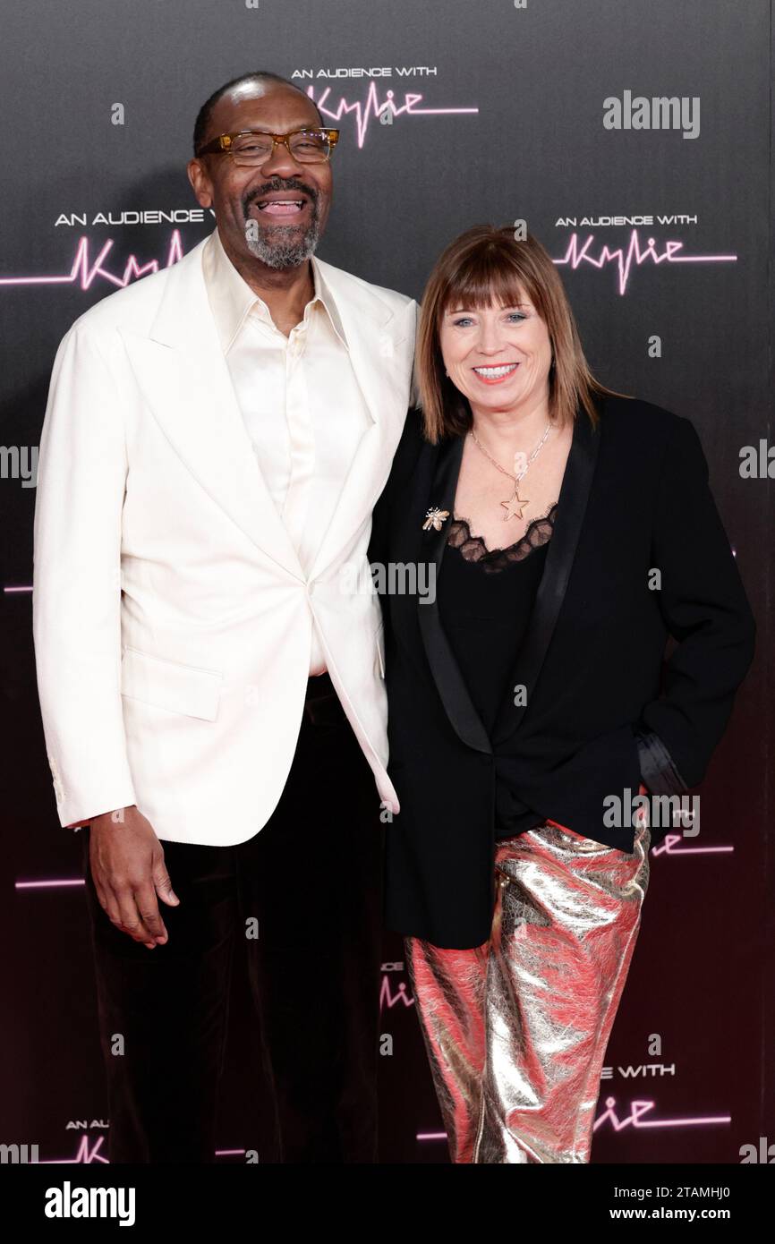 Lenny Henry, left, and Lisa Makin pose for photographers upon arrival ...