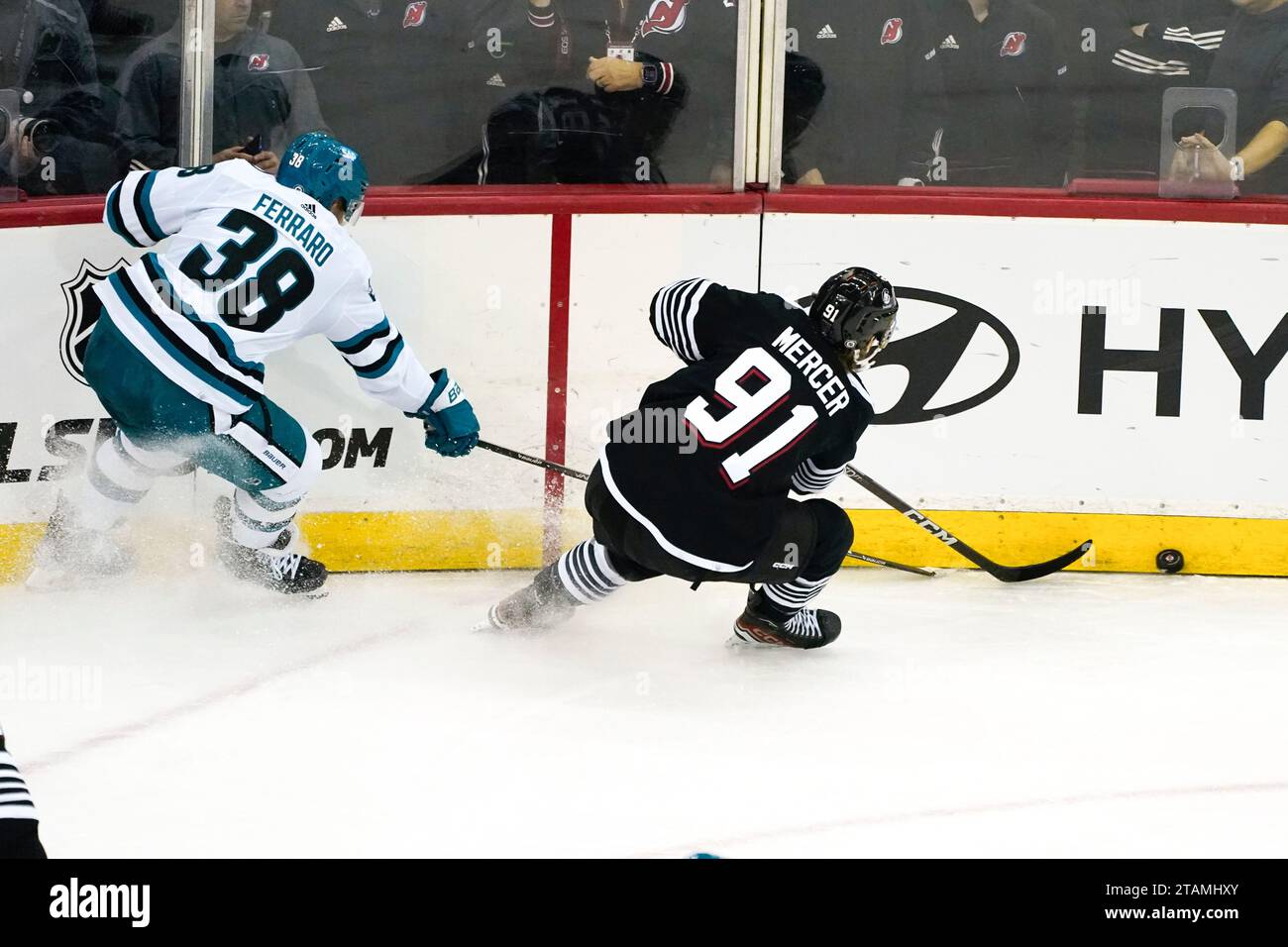 San Jose Sharks defenseman Mario Ferraro (38) pursues New Jersey Devils ...
