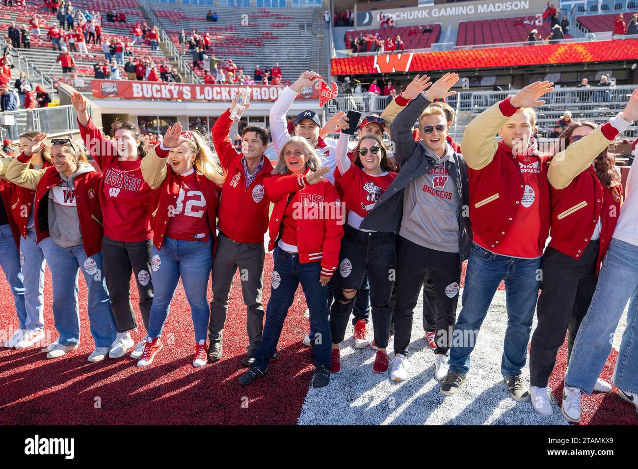 Wisconsin Badgers alums sing "Varsity" after a Big Ten Conference NCAA ...