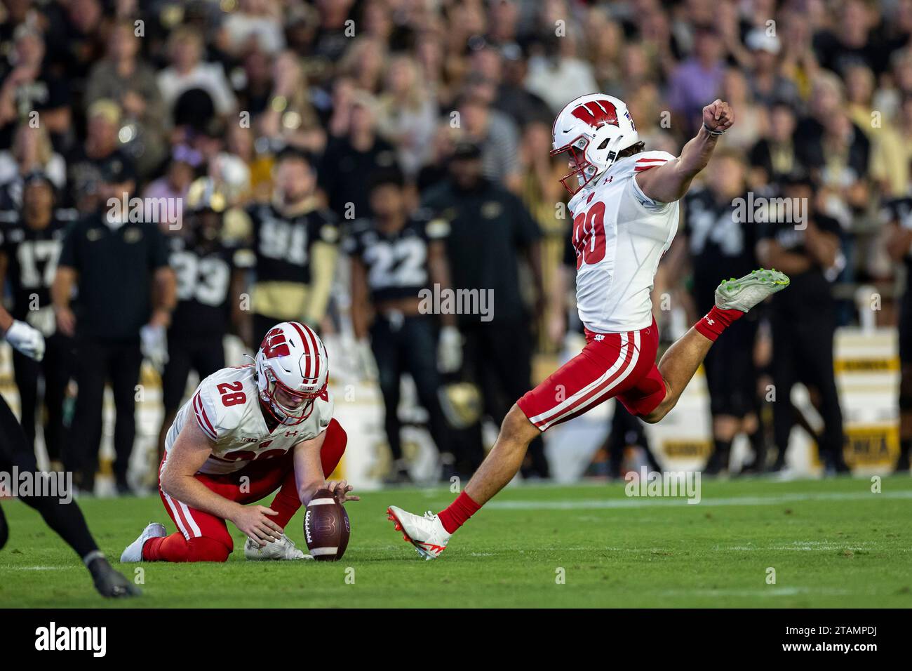 Wisconsin Badgers kicker Nathanial Vakos (90) kicks a field goal during ...