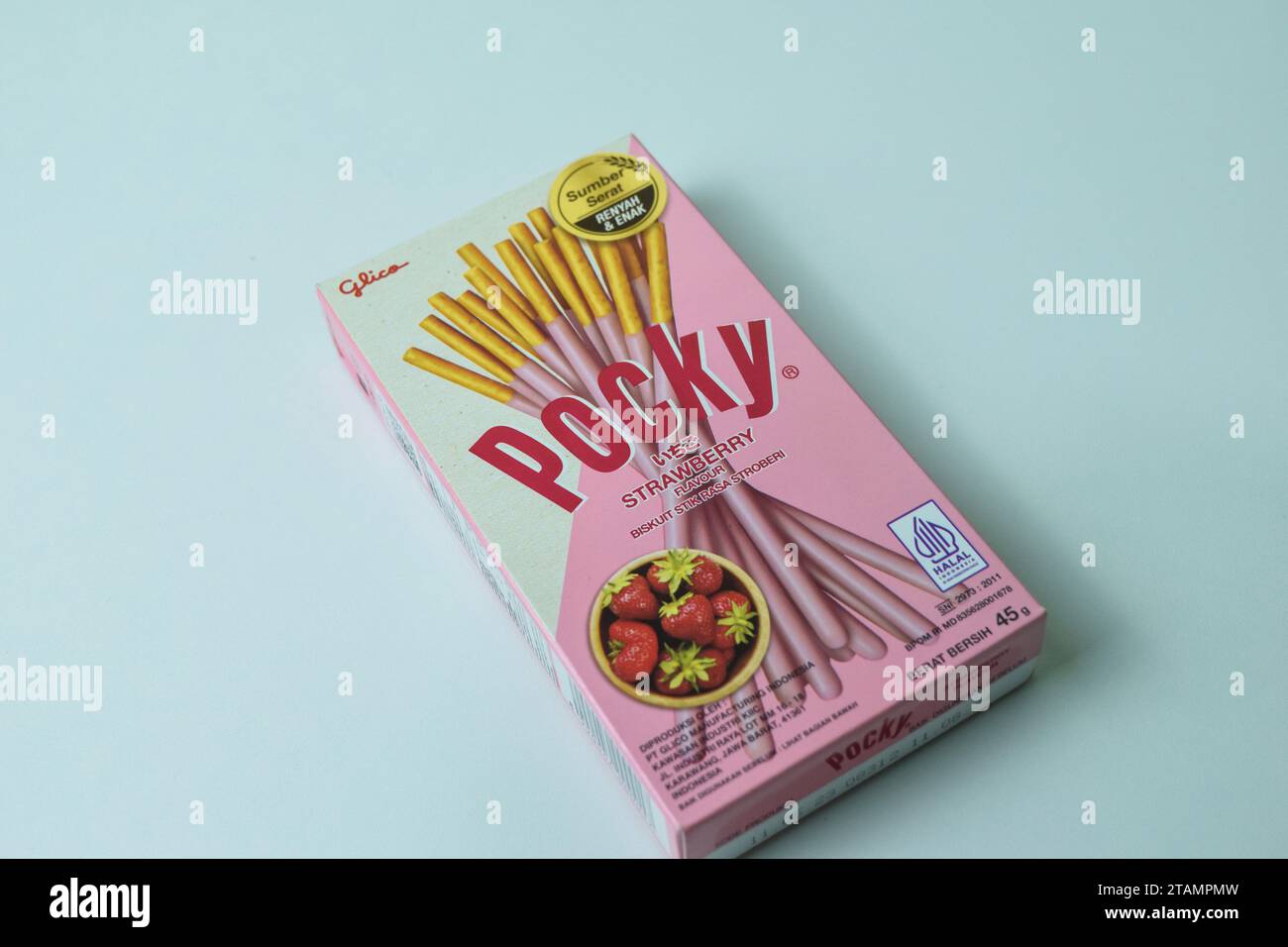 Pocky brand of chocolate sticks on white background. Pocky is a famous ...