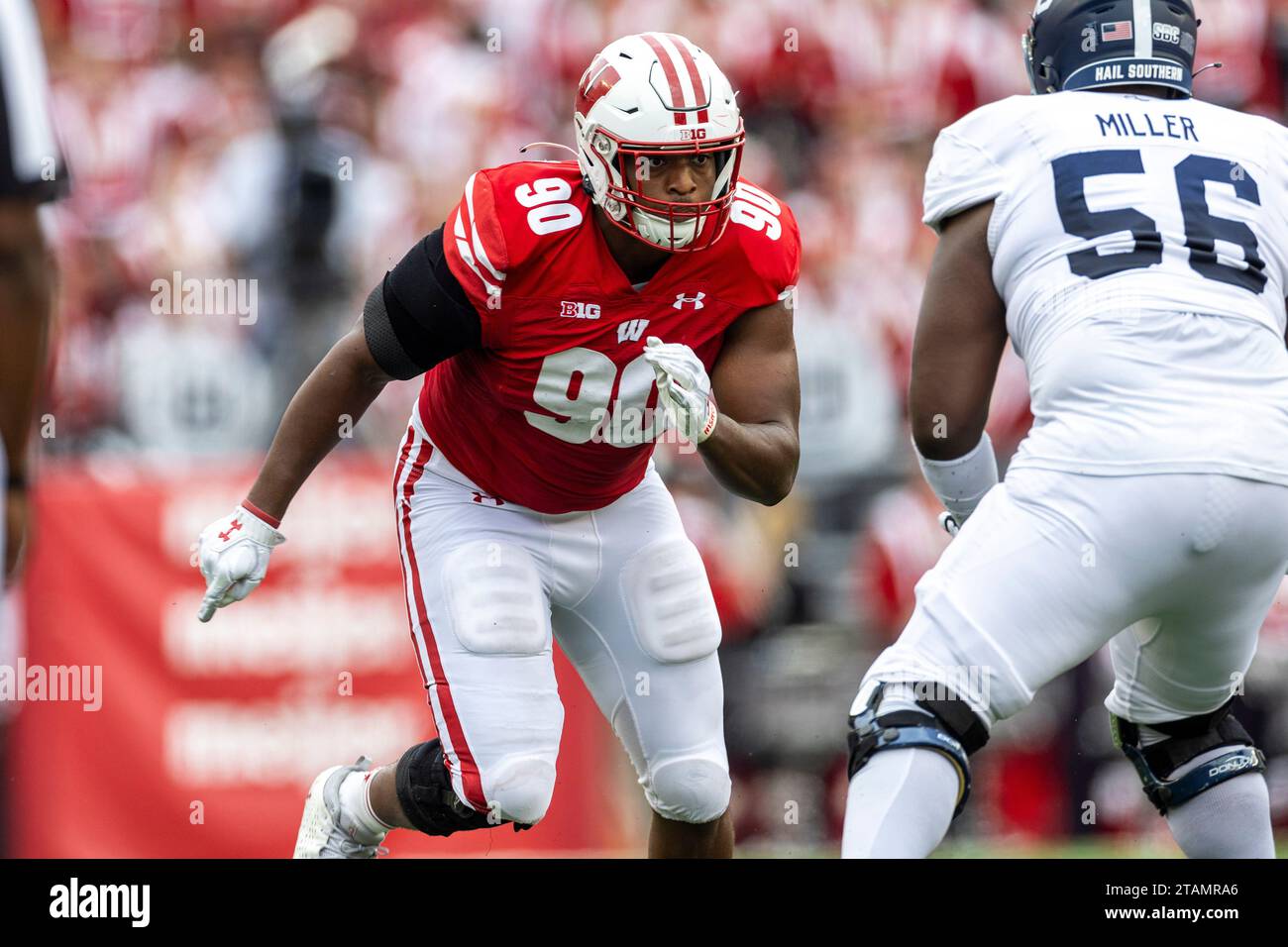 Wisconsin Badgers defensive lineman James Thompson Jr. (90) defends ...