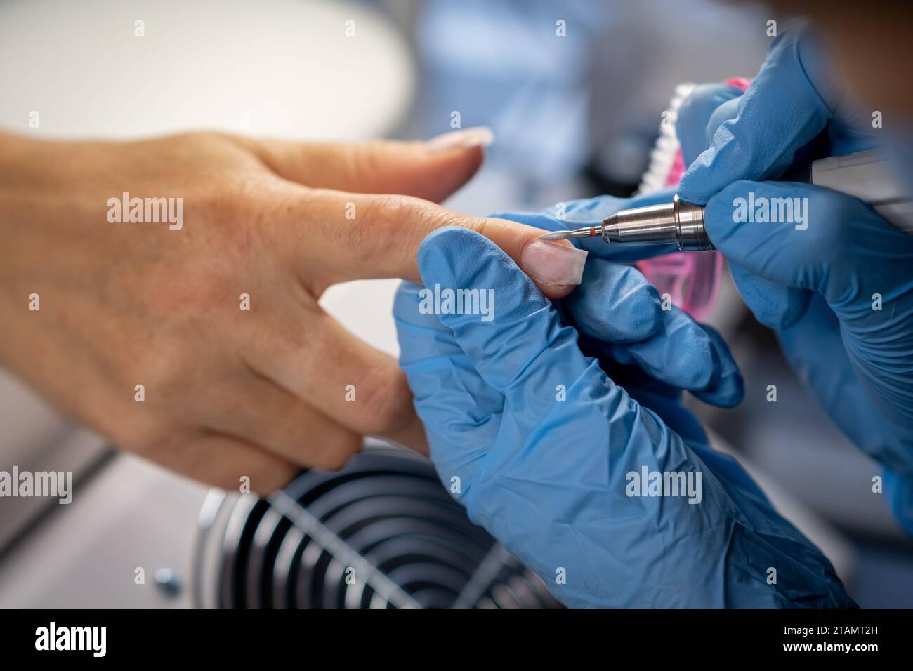 Female hands and tools for manicure, process of performing manicure ...