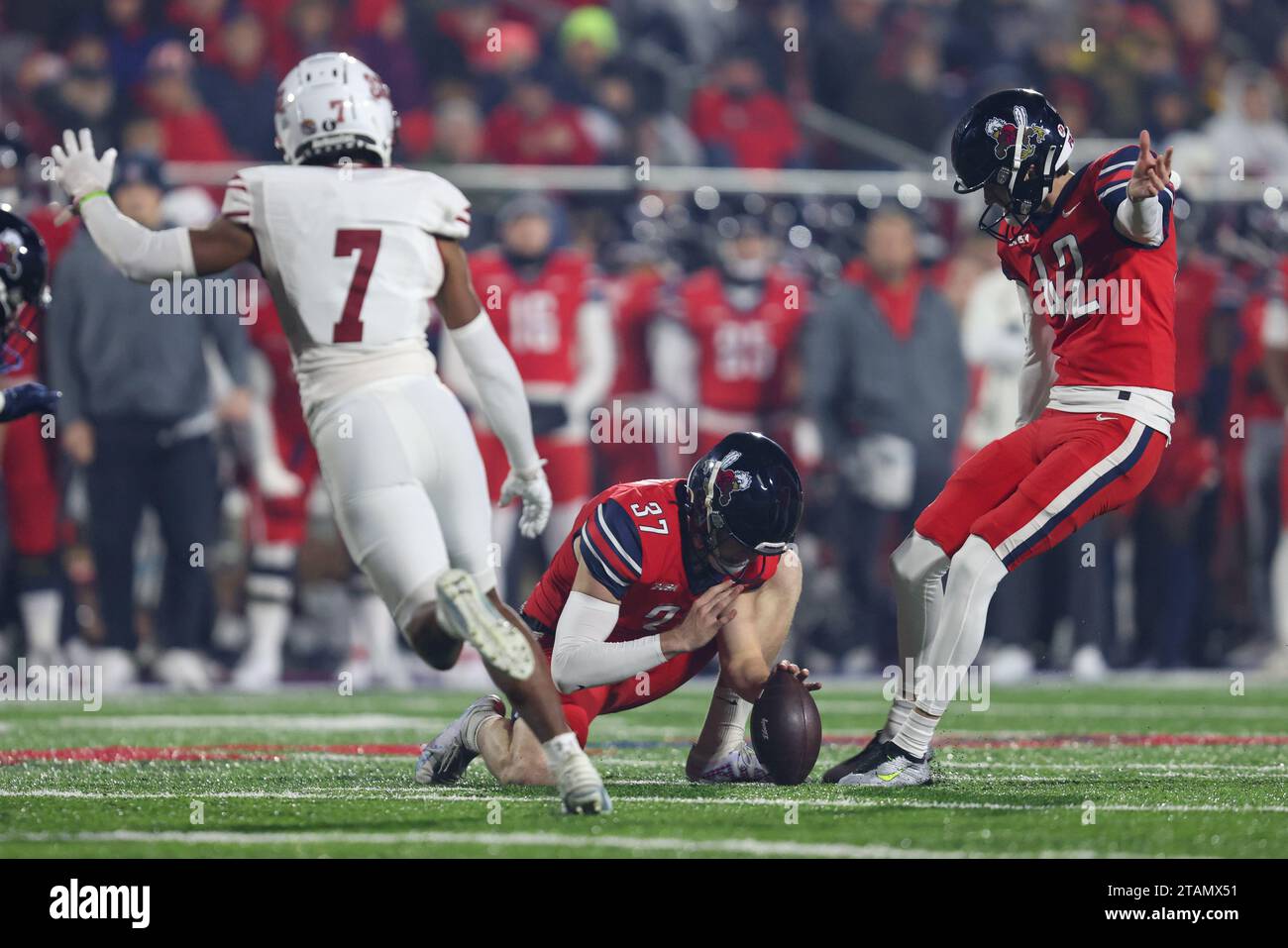 Lynchburg, Virginia, USA. 1st Dec, 2023. Liberty Flames place kicker Nick Brown (42) kicks a ...