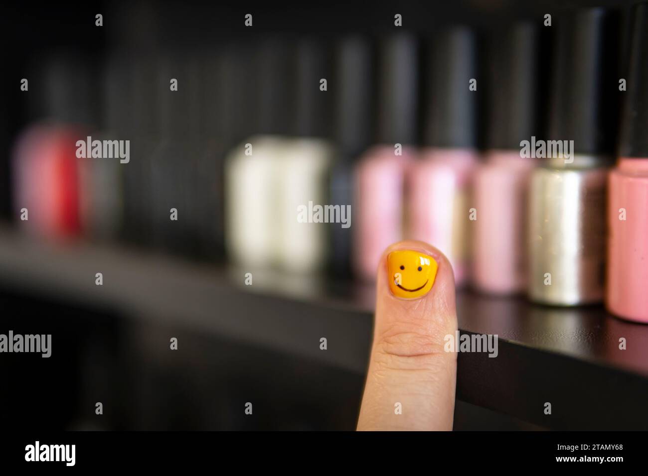 A man with painted nails. Design of male nails. men manicure. Choosing ...