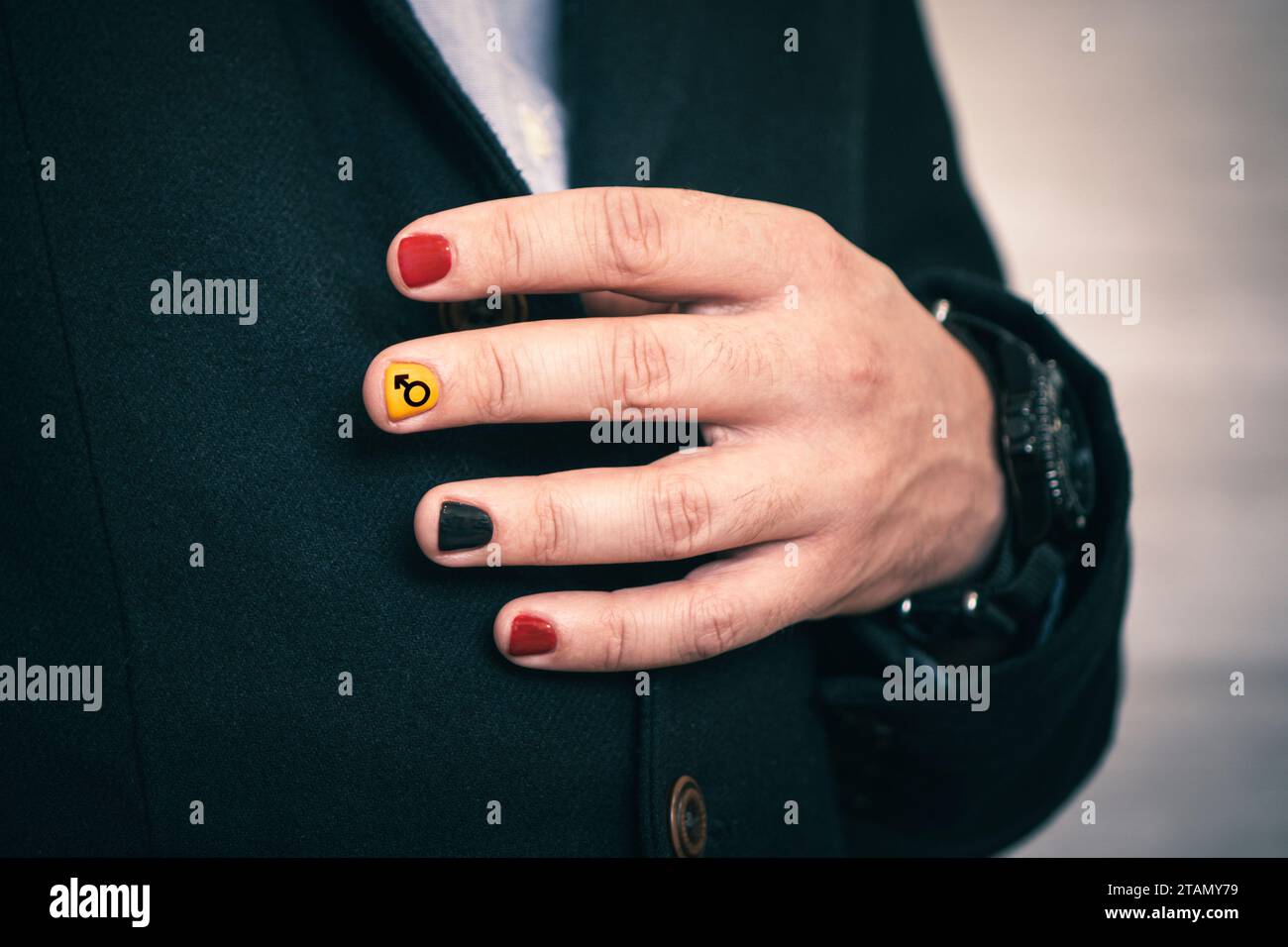 A man with painted nails. Design of male nails. men manicure. a young ...