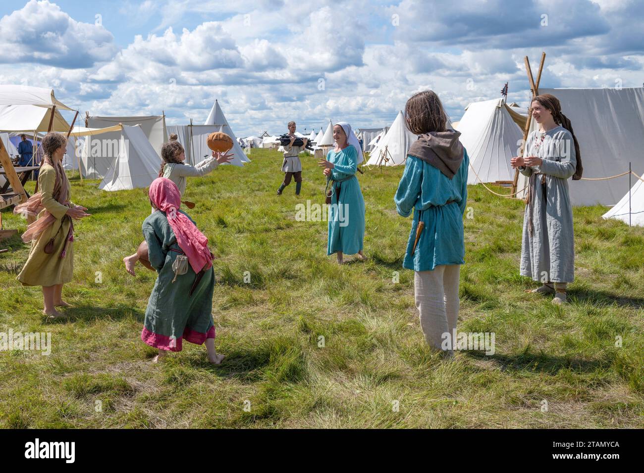 TVER REGION, RUSSIA - JULY 21, 2023: Children in old costumes play in the historical camp of the ...
