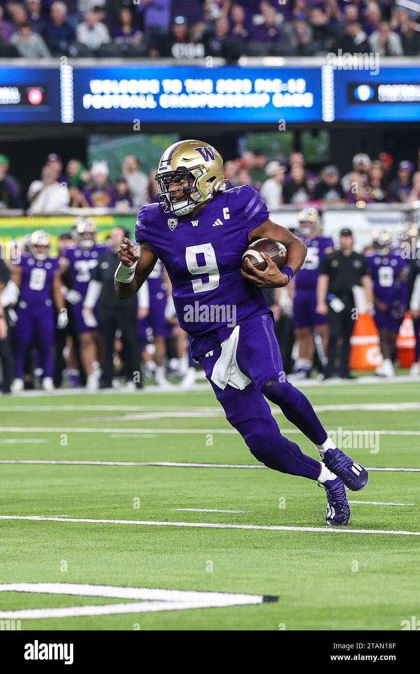December 01, 2023: Washington Huskies quarterback Michael Penix Jr. (9) runs with the football ...