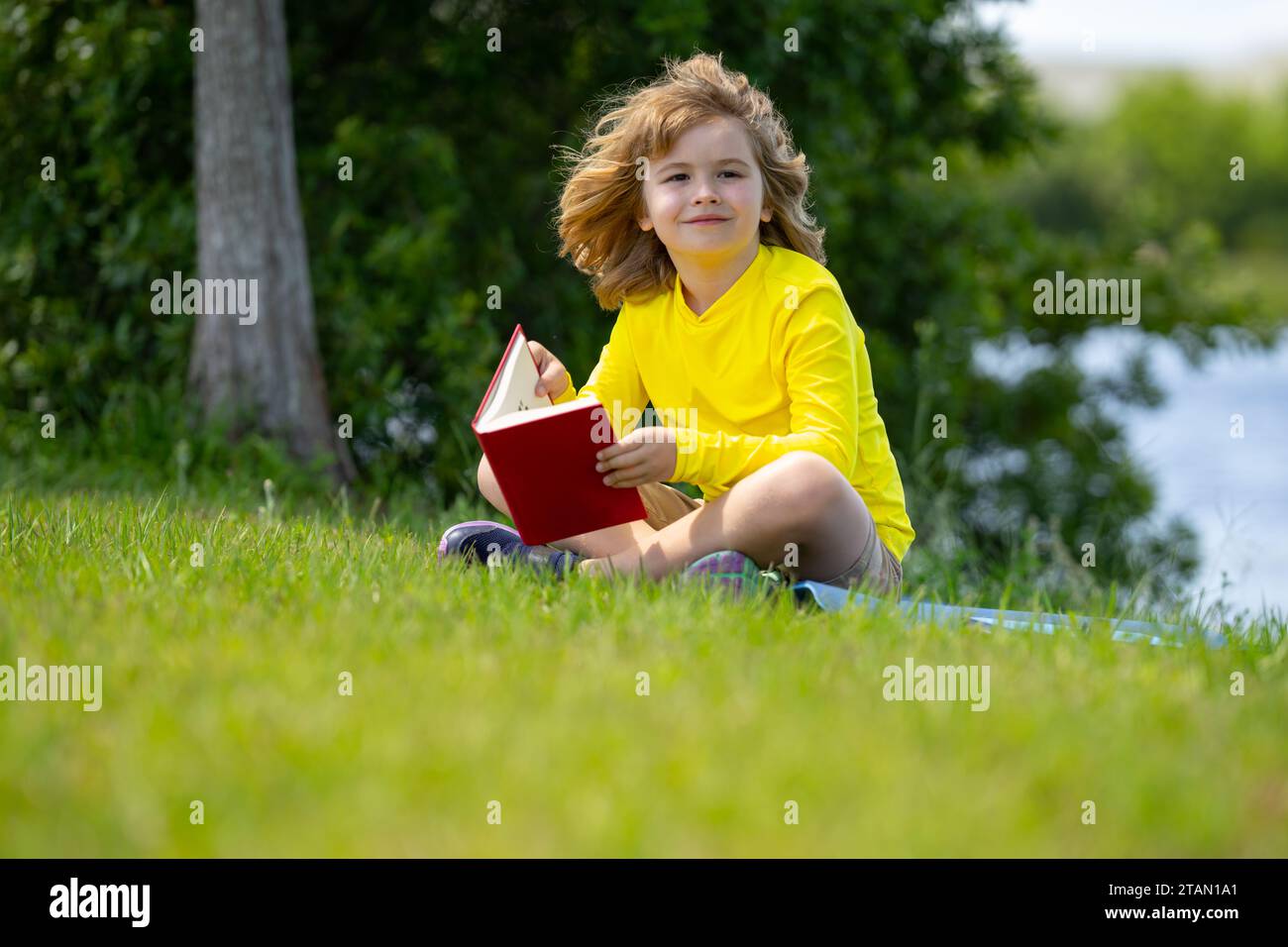 Kid read a book. Early education for kids. Summer vacation with reading ...