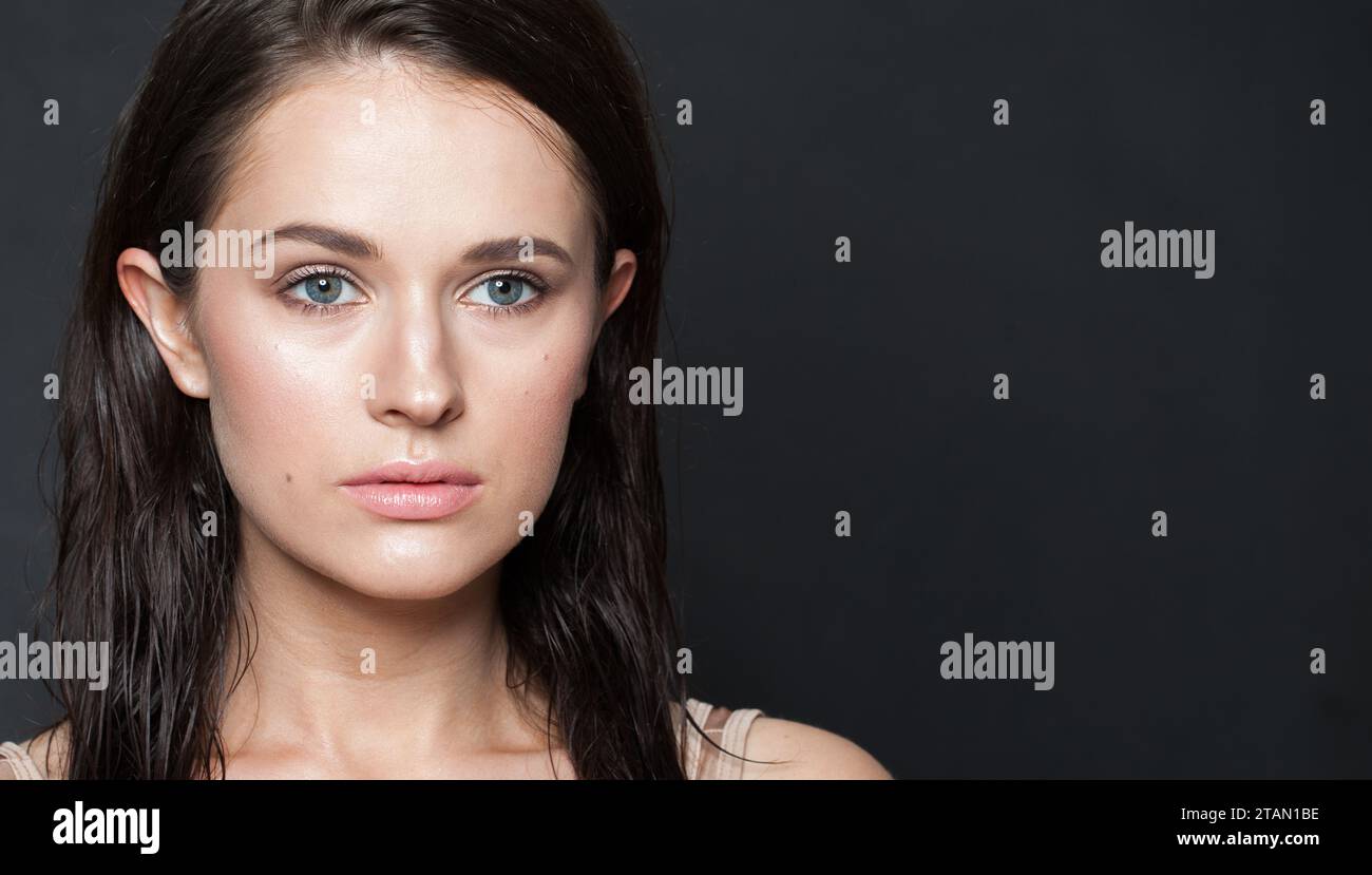 Elegant female model with natural makeup and healthy clear fresh skin ...