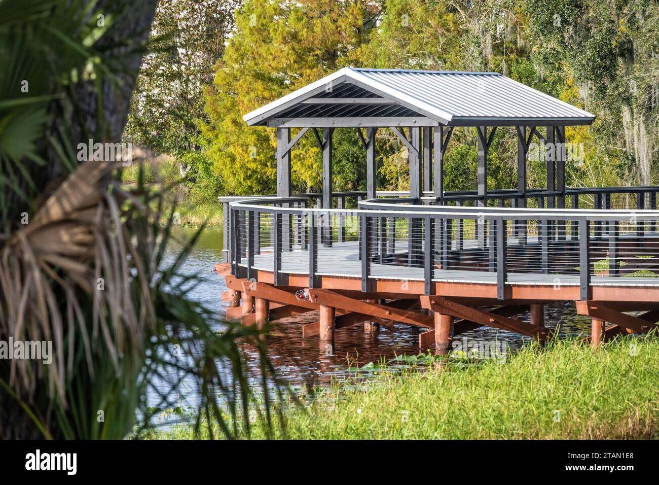 Boardwalk with covered shelter at Lake David Park in downtown Groveland ...