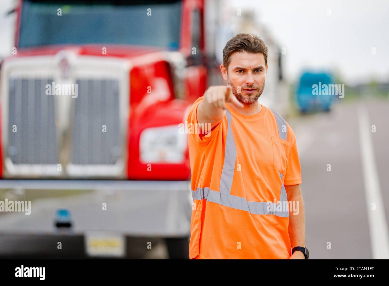 Men driver near lorry truck. Man owner truck driver in safety vest near ...
