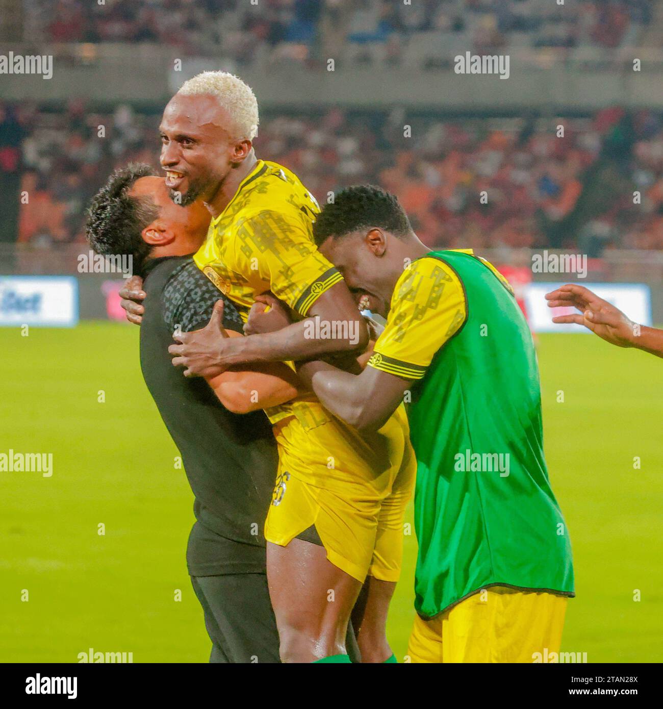 DAR ES SALAAM, TANZANIA - NOVEMBER 5: Pacome Zouzoua of Yanga celebrate ...