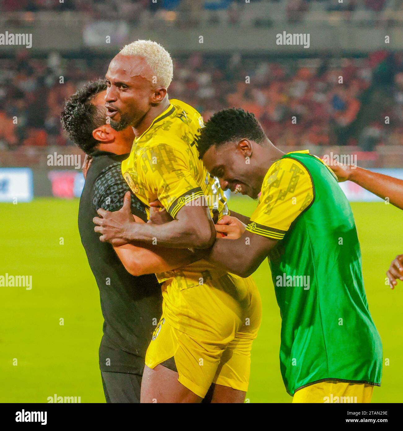 DAR ES SALAAM, TANZANIA - NOVEMBER 5: Pacome Zouzoua of Yanga celebrate ...