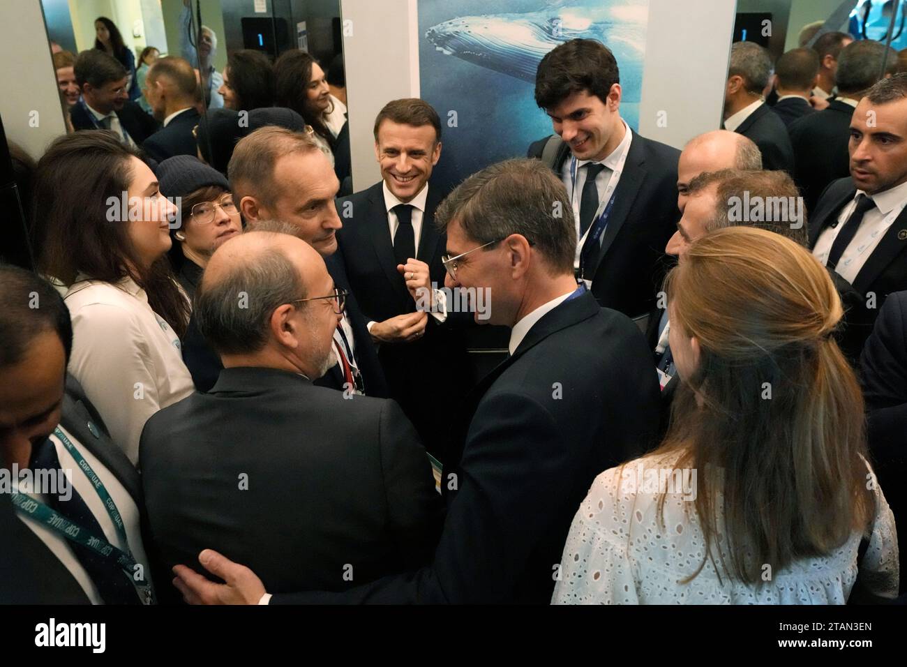 France President Emmanuel Macron takes an elevator after an event on ...