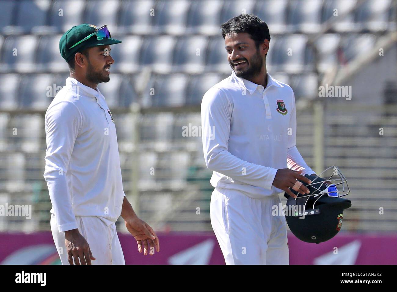 Bangladeshi cricketer Mahidy Hasan Miraz, left, and Mahmudul Hasan Joy ...
