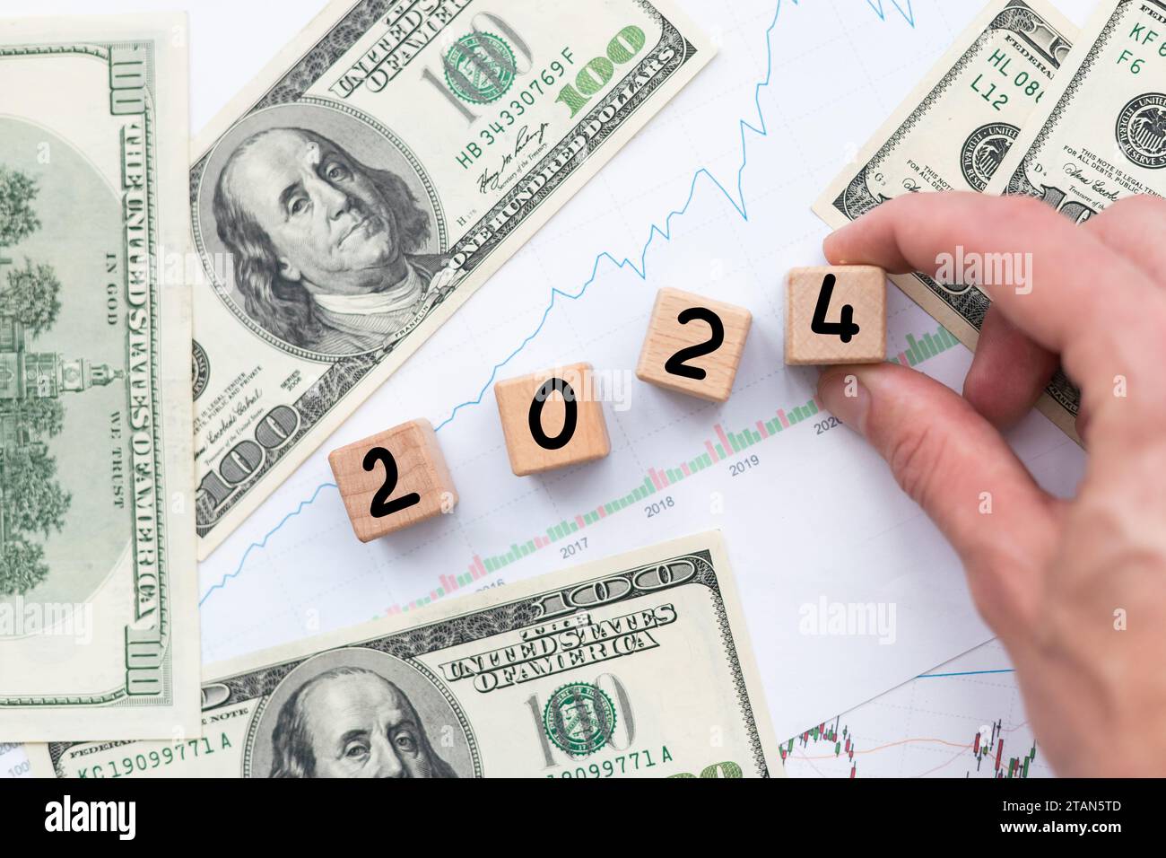 woodblocks cubes square with number 2024 on sand, business goals next ...