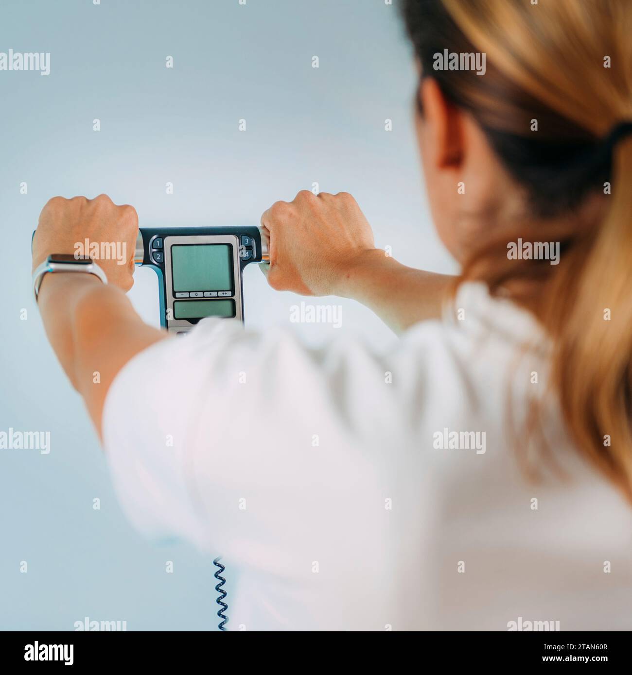 Woman using body composition scales Stock Photo - Alamy