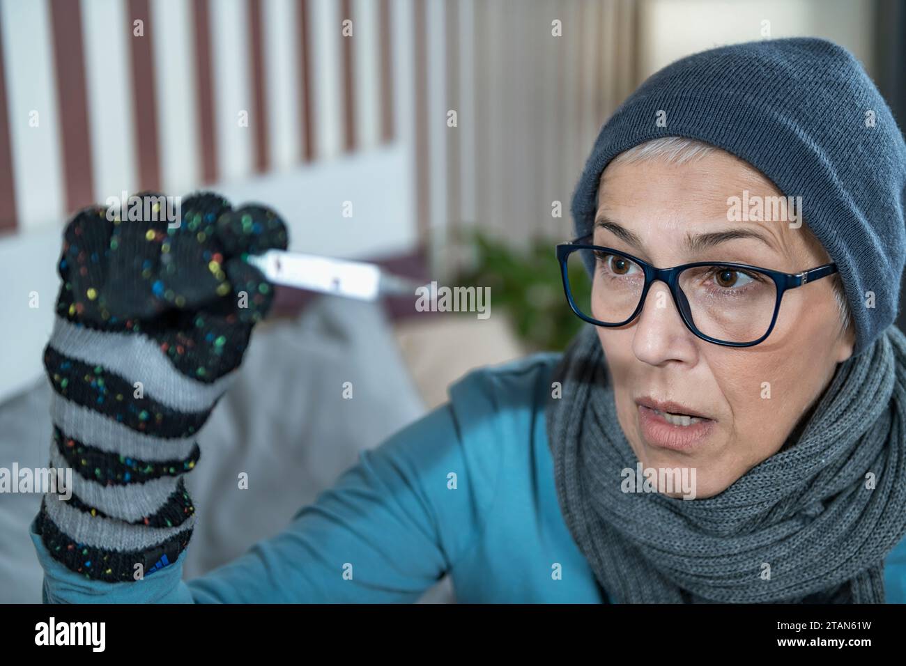 Woman measuring body temperature Stock Photo - Alamy
