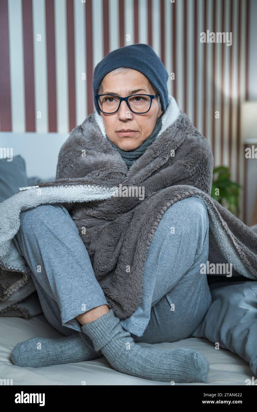 Senior woman feeling unwell hi-res stock photography and images - Alamy