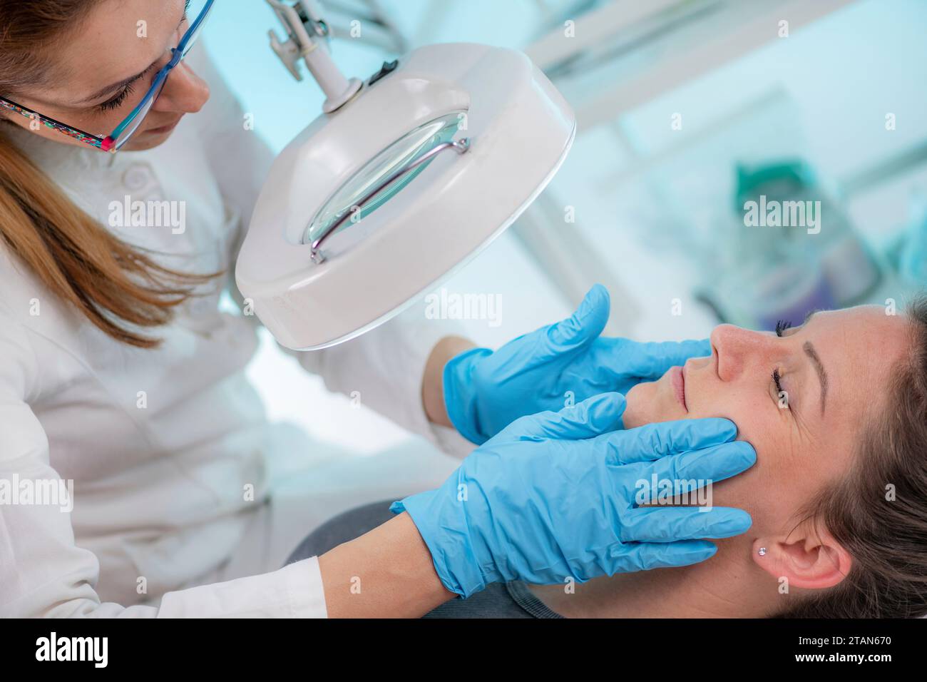 Dermatologist skin exam hi-res stock photography and images - Alamy