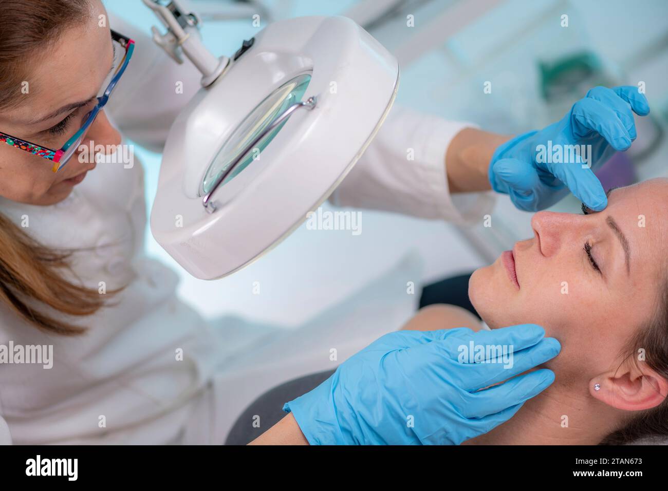 Dermatologist skin exam hi-res stock photography and images - Alamy