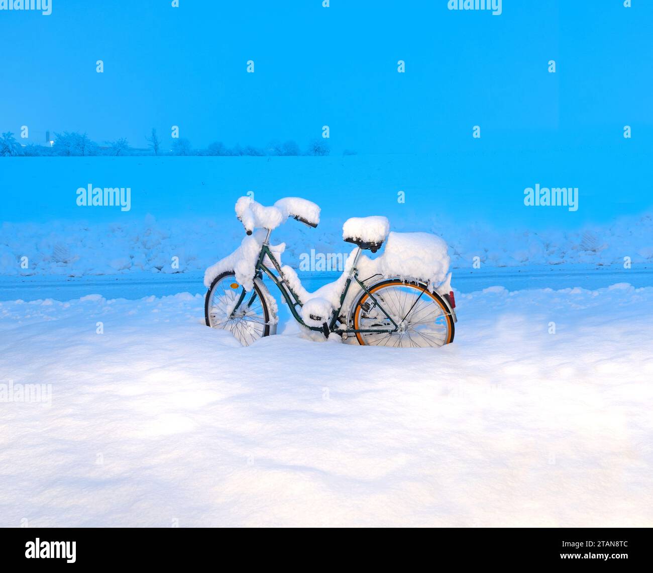 simple cheap one gear bicycle Plattling, Bavaria, Germany after heavy ...